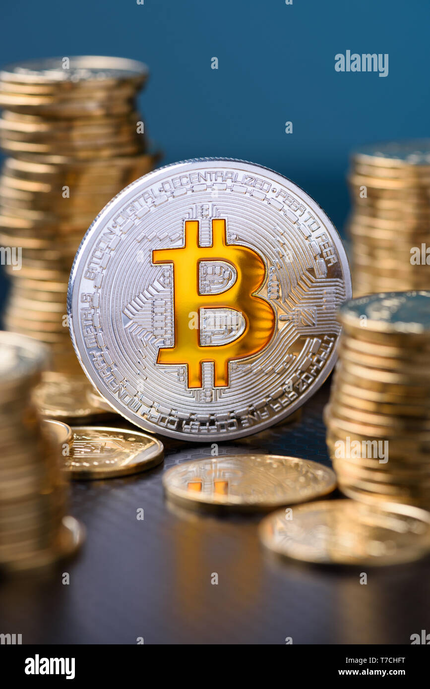 Bitcoin. Bitcoin coin with golden bit sybmol logo and gold coins stacks ...