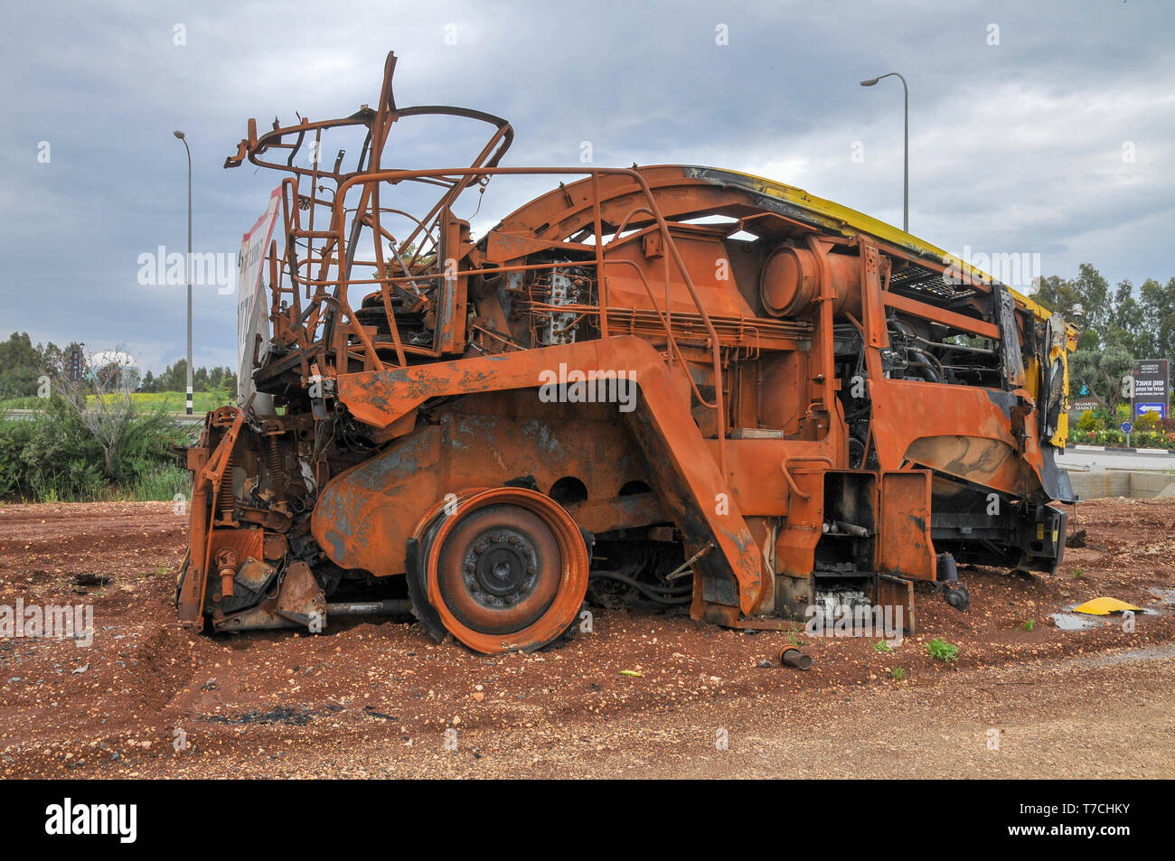 Damaged and Burnt, rusty combine harvester. Photographed in Israel ...