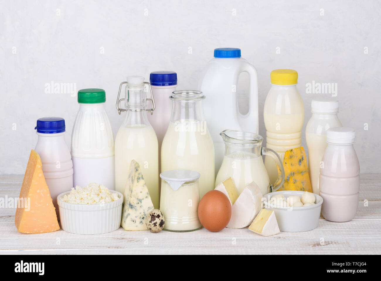Big set of dairy products on white wooden table still life Stock Photo ...