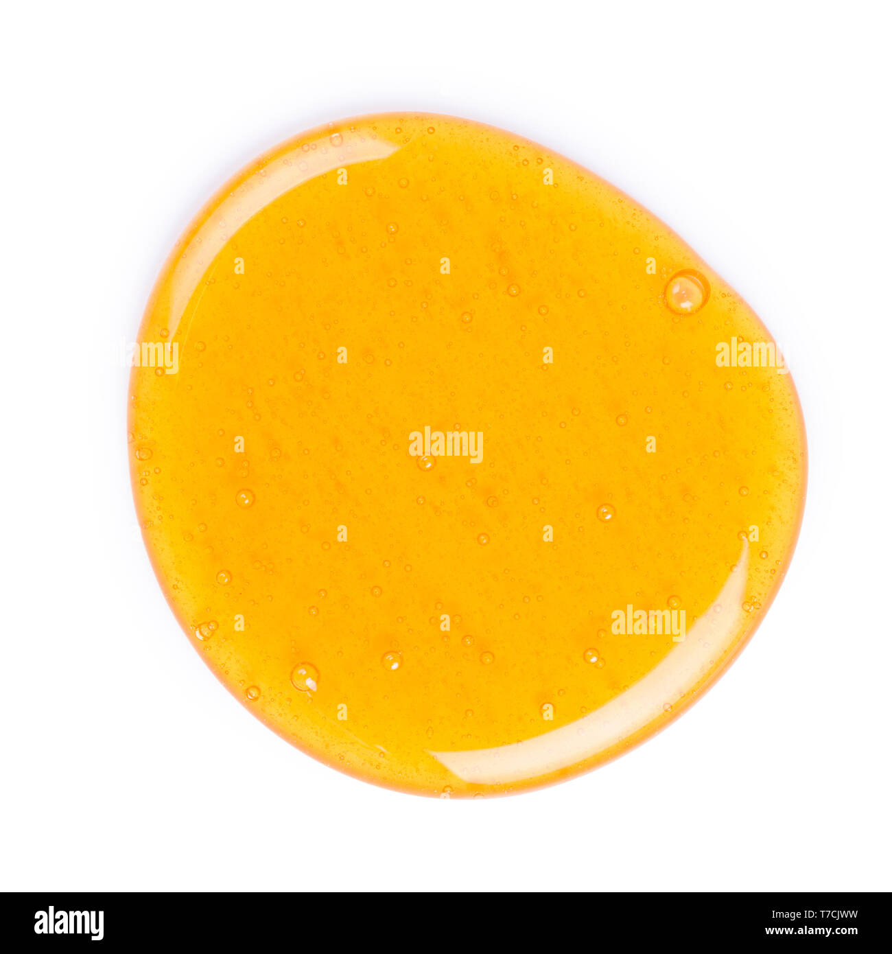 Big honey drop isolated on white background Stock Photo - Alamy