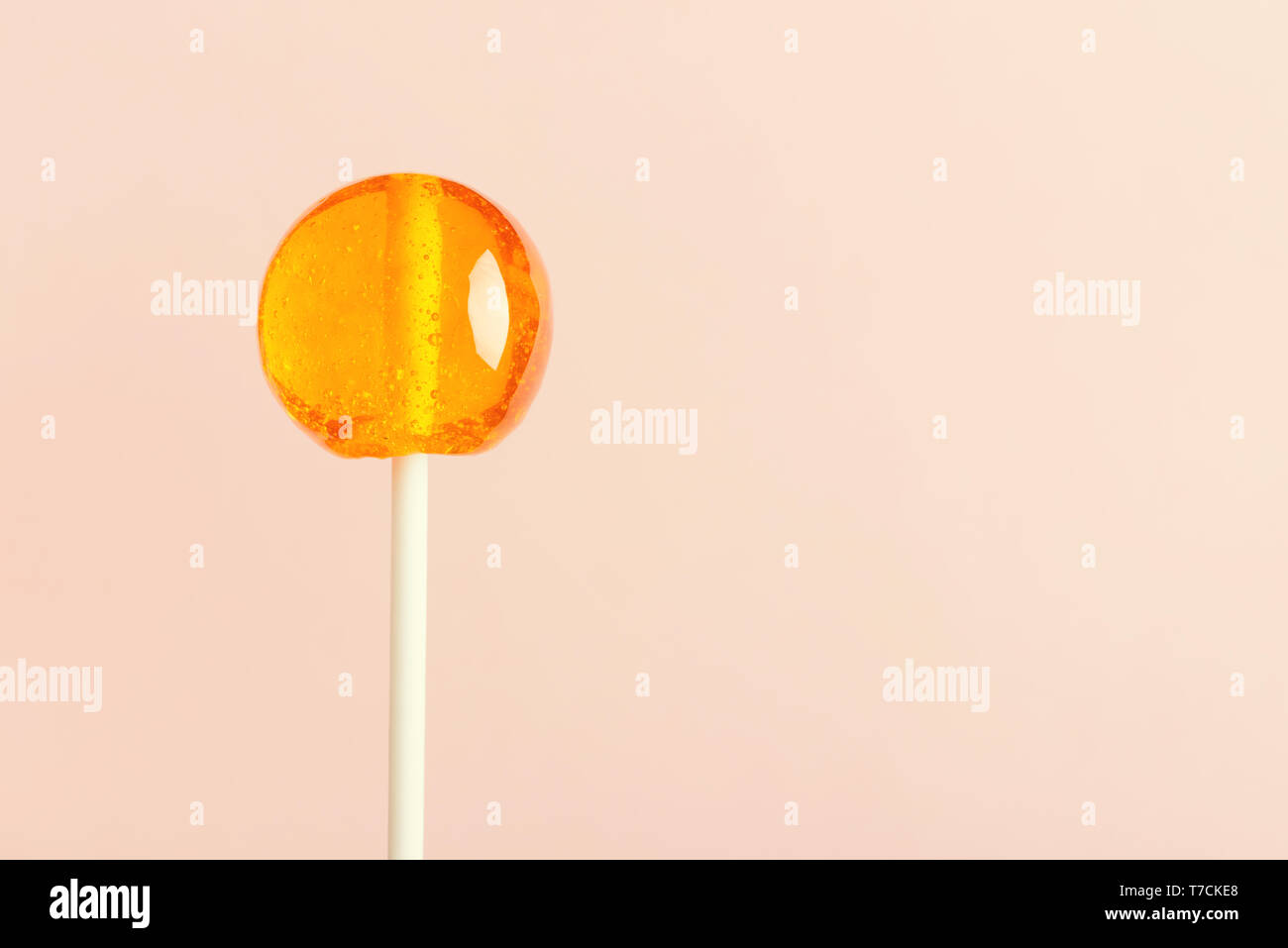Single lollipop on pink pastel background with copy space Stock Photo ...