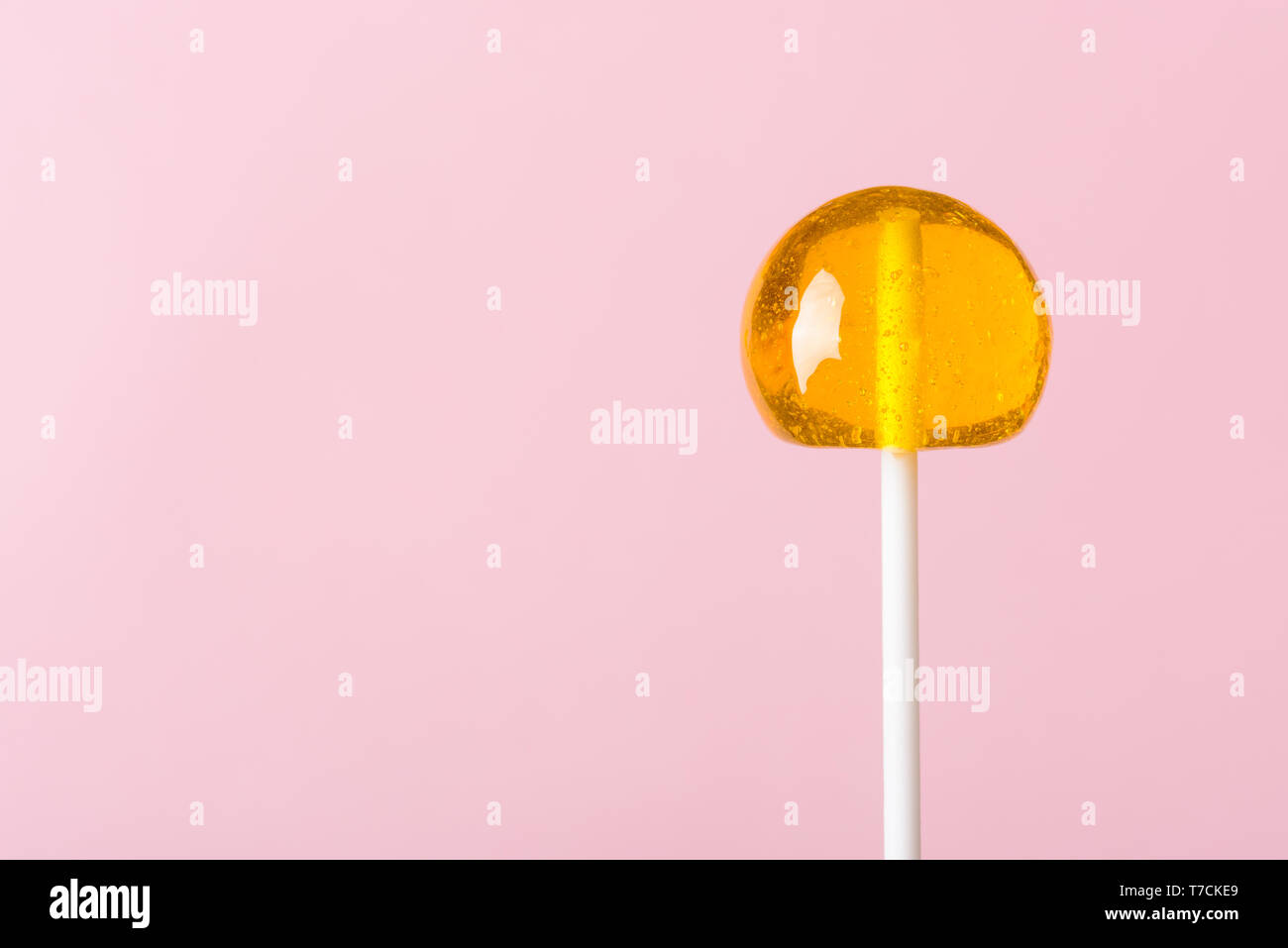 Lollipop on pink pastel background with copy space Stock Photo - Alamy