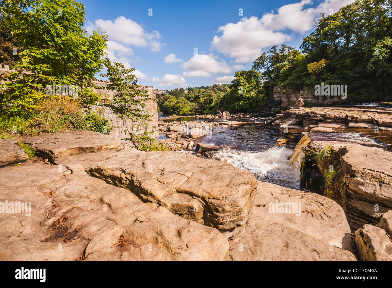 A scenic view of the cascading waterfalls of the River Swale at ...