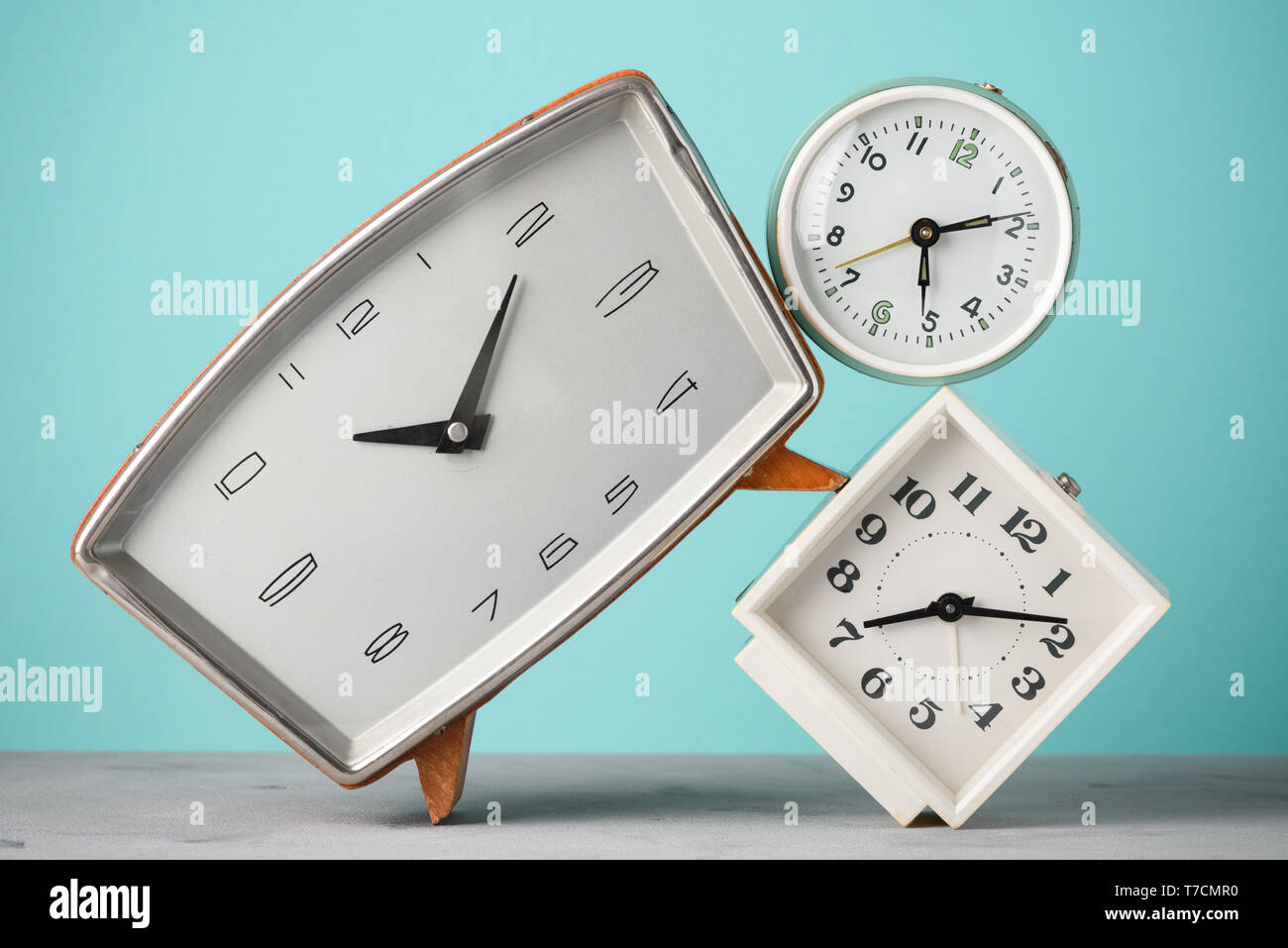 Retro alarm clocks stack time concept Stock Photo - Alamy