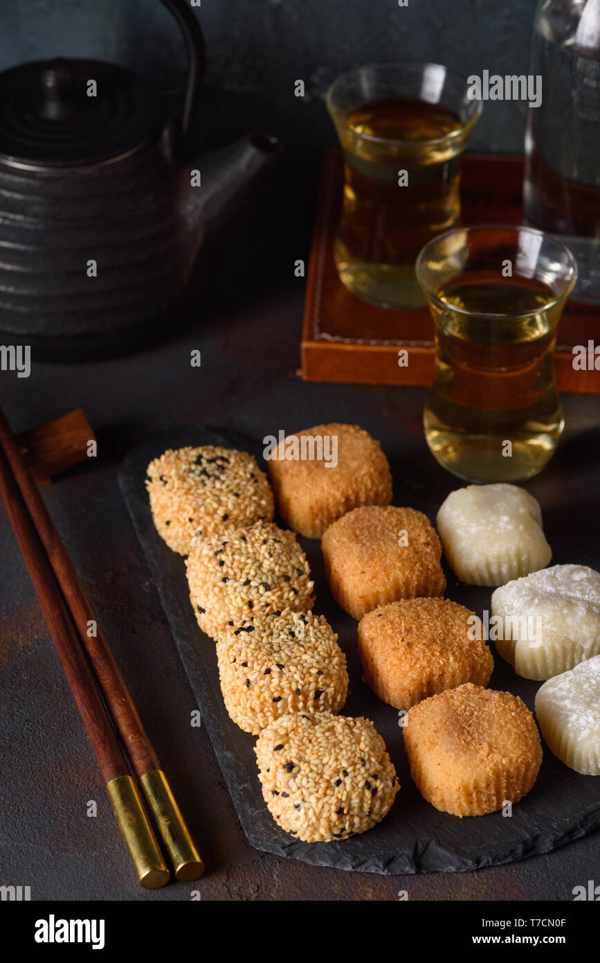 Mochi assortment on slate plate japanese rice dessert Stock Photo - Alamy