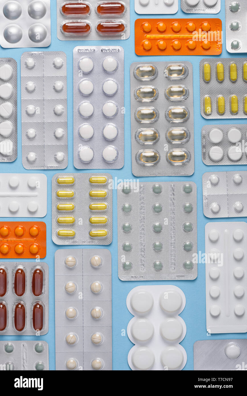 Pills in blisters assortment pattern top view Stock Photo - Alamy