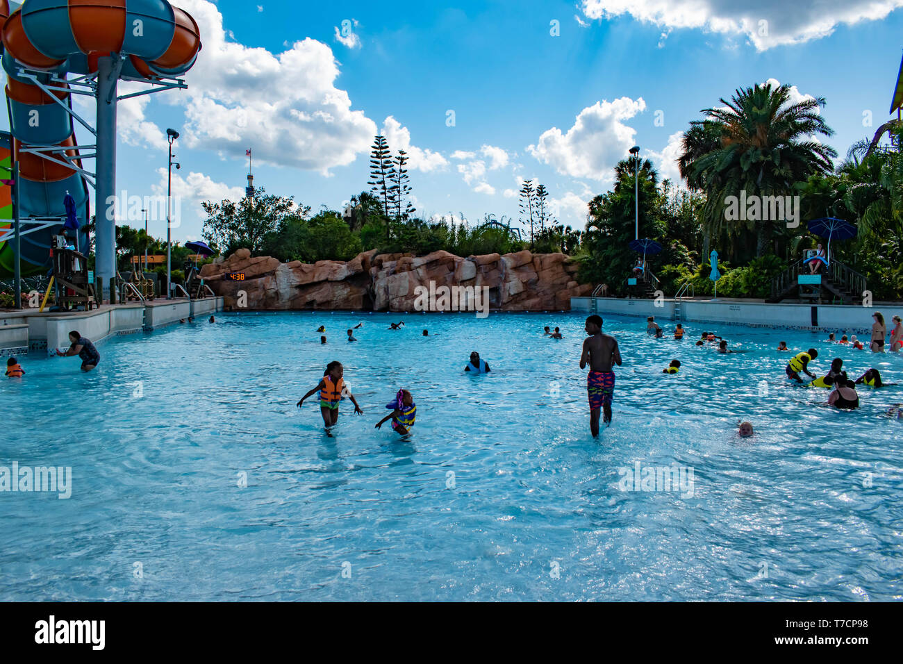 Orlando, Florida. April 26, 2019. People enjoying wave pool and partial ...