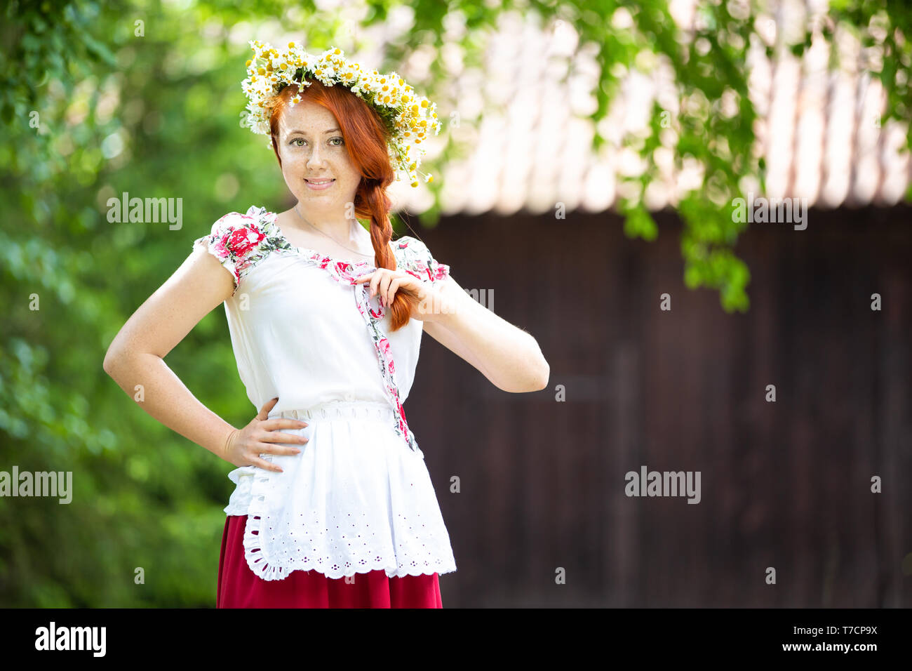 A girl from the village in a traditional outfit Stock Photo - Alamy