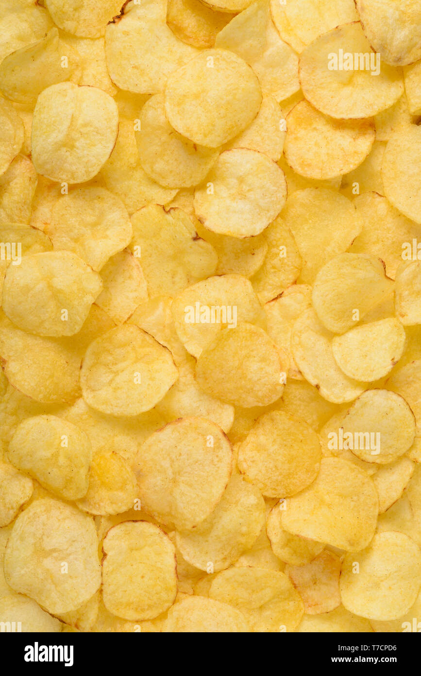 Potato chips texture background top view flat lay Stock Photo - Alamy