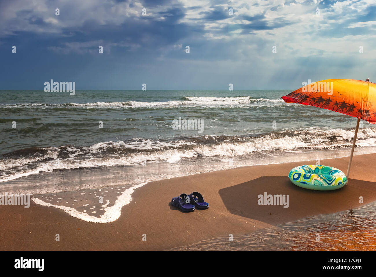Summer holiday on the beach with golden sand Stock Photo - Alamy