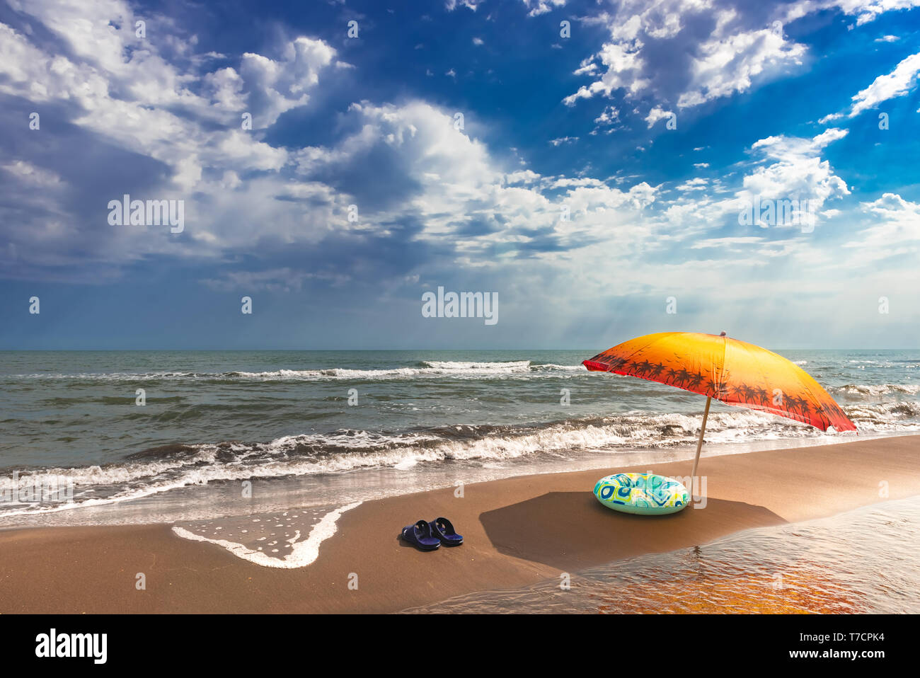 Summer holiday on the beach with golden sand Stock Photo - Alamy