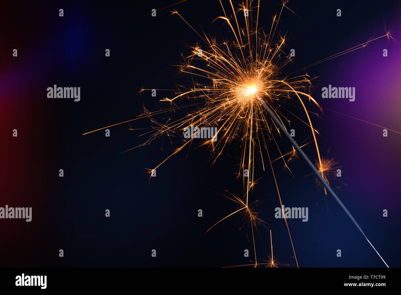 Bengal fire sparkler burn with big long sparks Stock Photo - Alamy