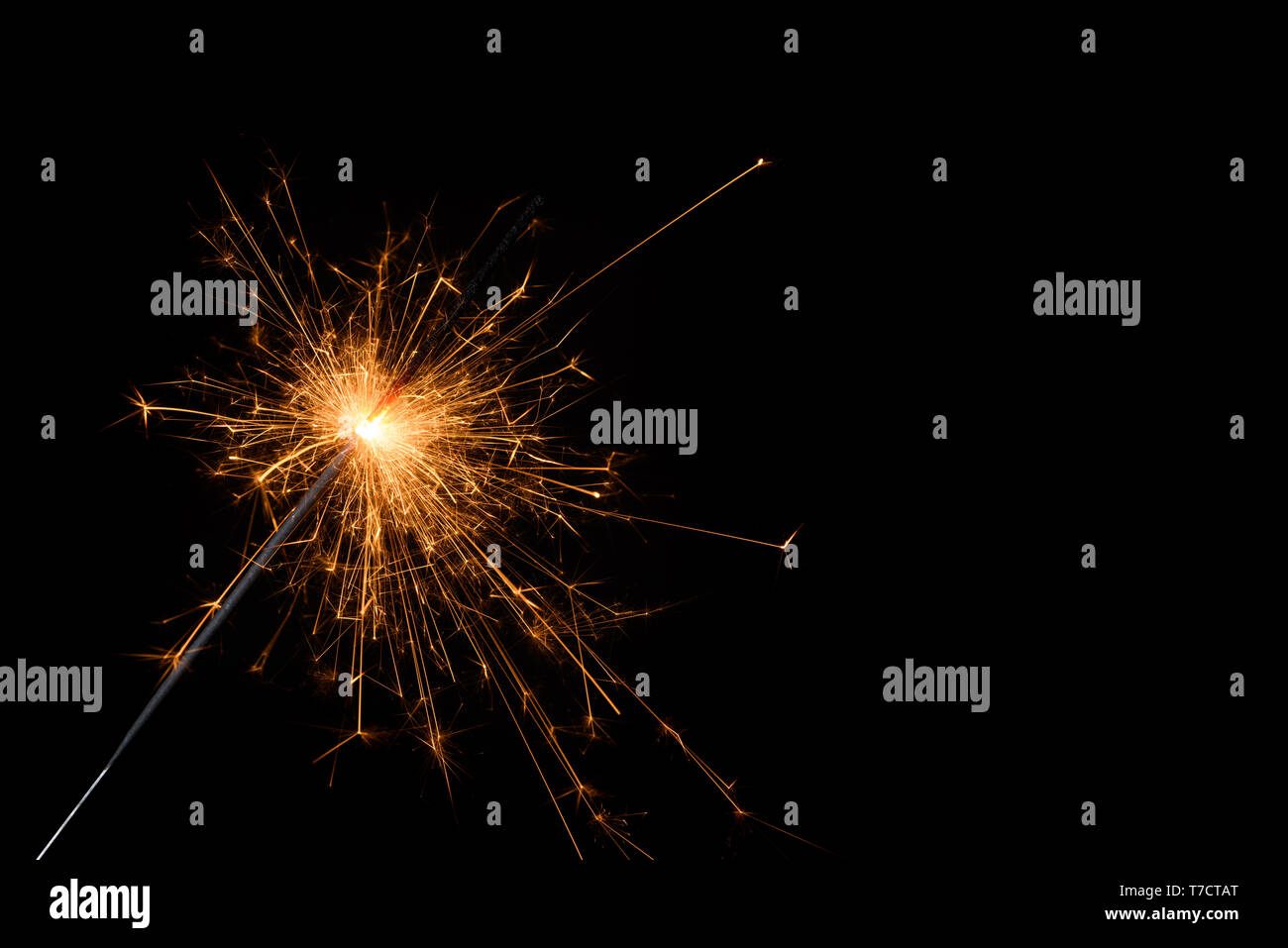 Sparkler isolated on black. Burning bengal fire Stock Photo - Alamy