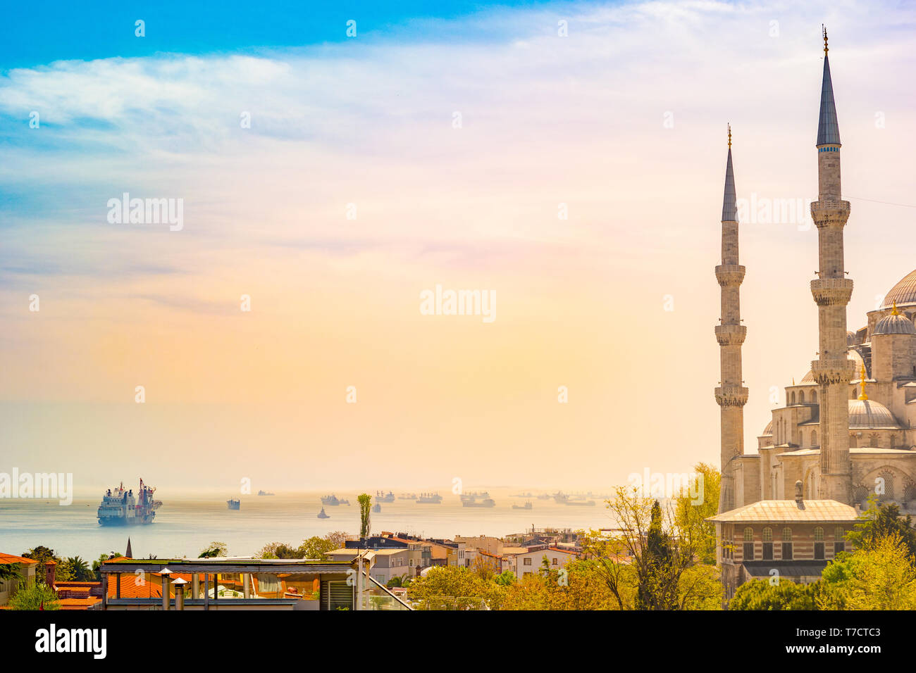 Minarets and domes of Blue Mosque with Bosporus and Marmara sea and ...