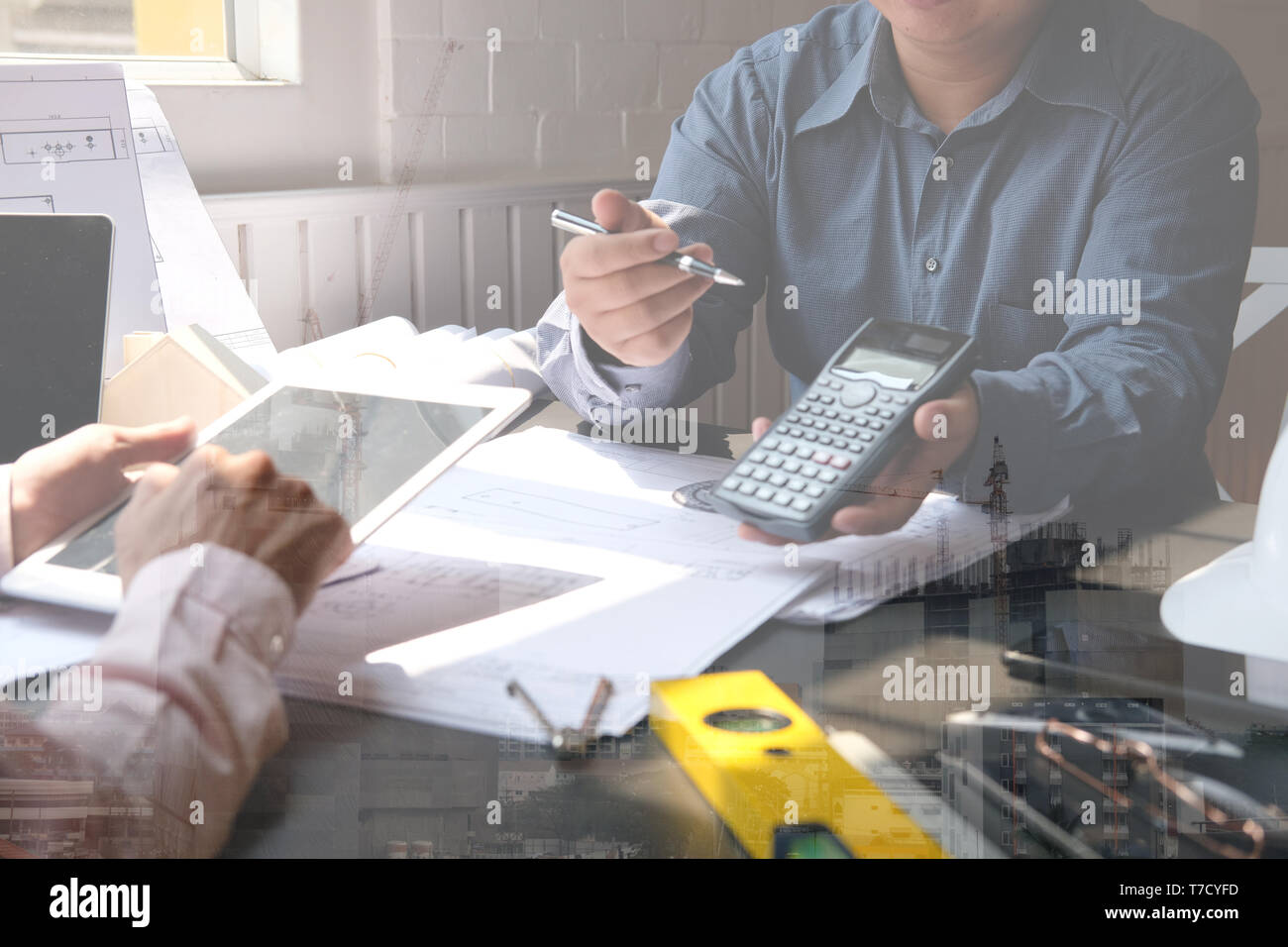 architect engineer team working on house blueprint of real estate ...