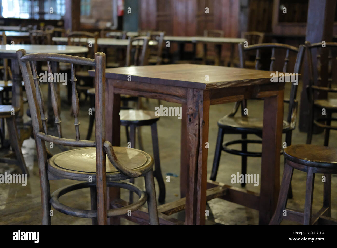 wooden chair table in cafe coffee shop restaurant. interior decoration ...