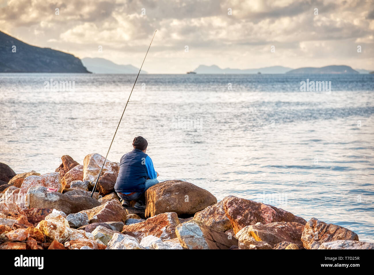 Angler with rod hi-res stock photography and images - Alamy