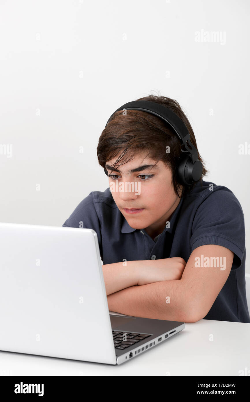 Teenage boy watching computer screen hi-res stock photography and ...