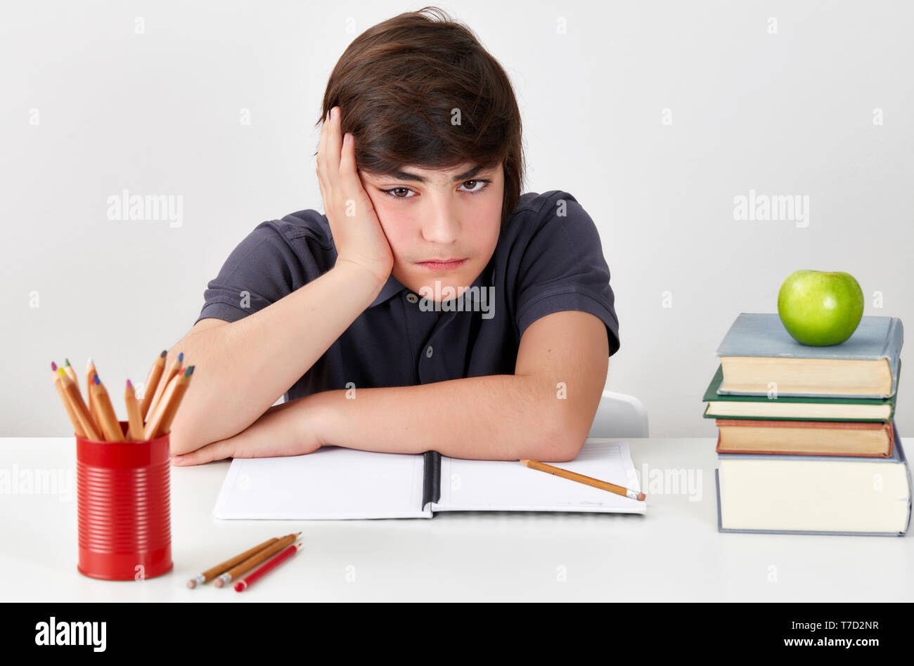 Upset boy studying hi-res stock photography and images - Alamy