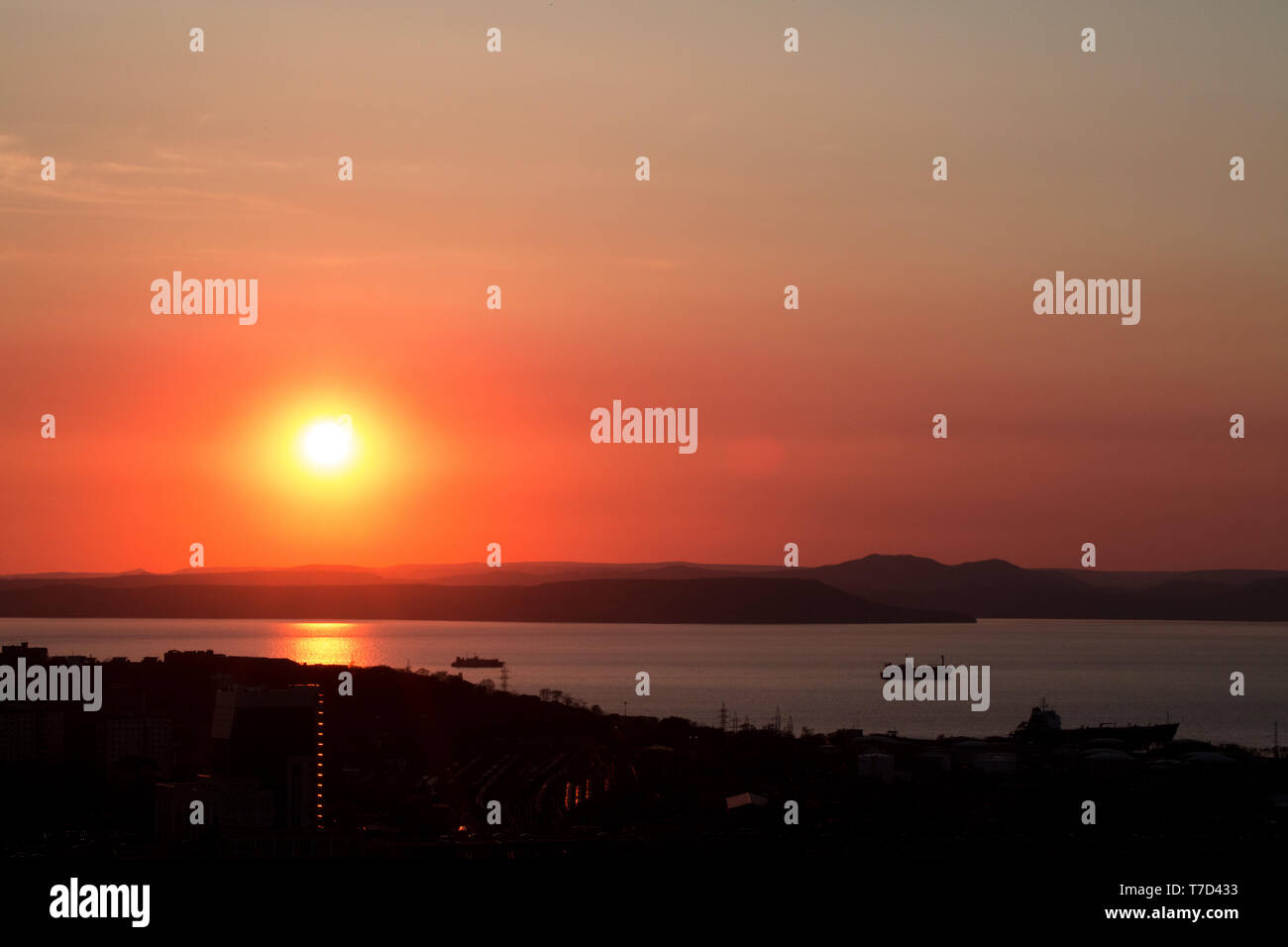 Red, beautiful colorful sunset, sunrise on the sea. Dramatic story with ...