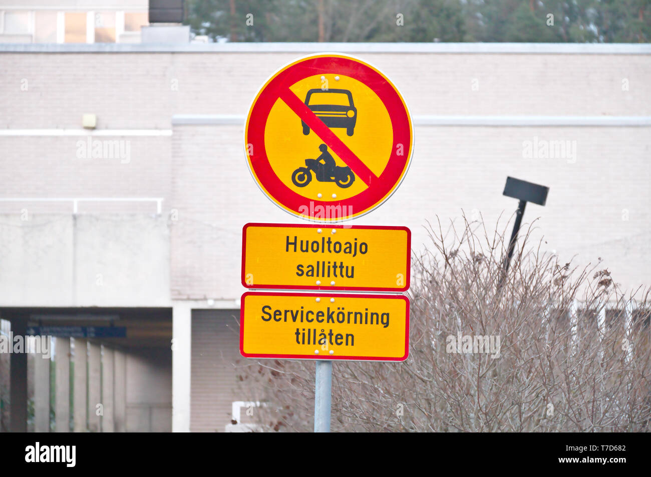 Yellow sign No Driving in Finnish and Swedish Stock Photo - Alamy