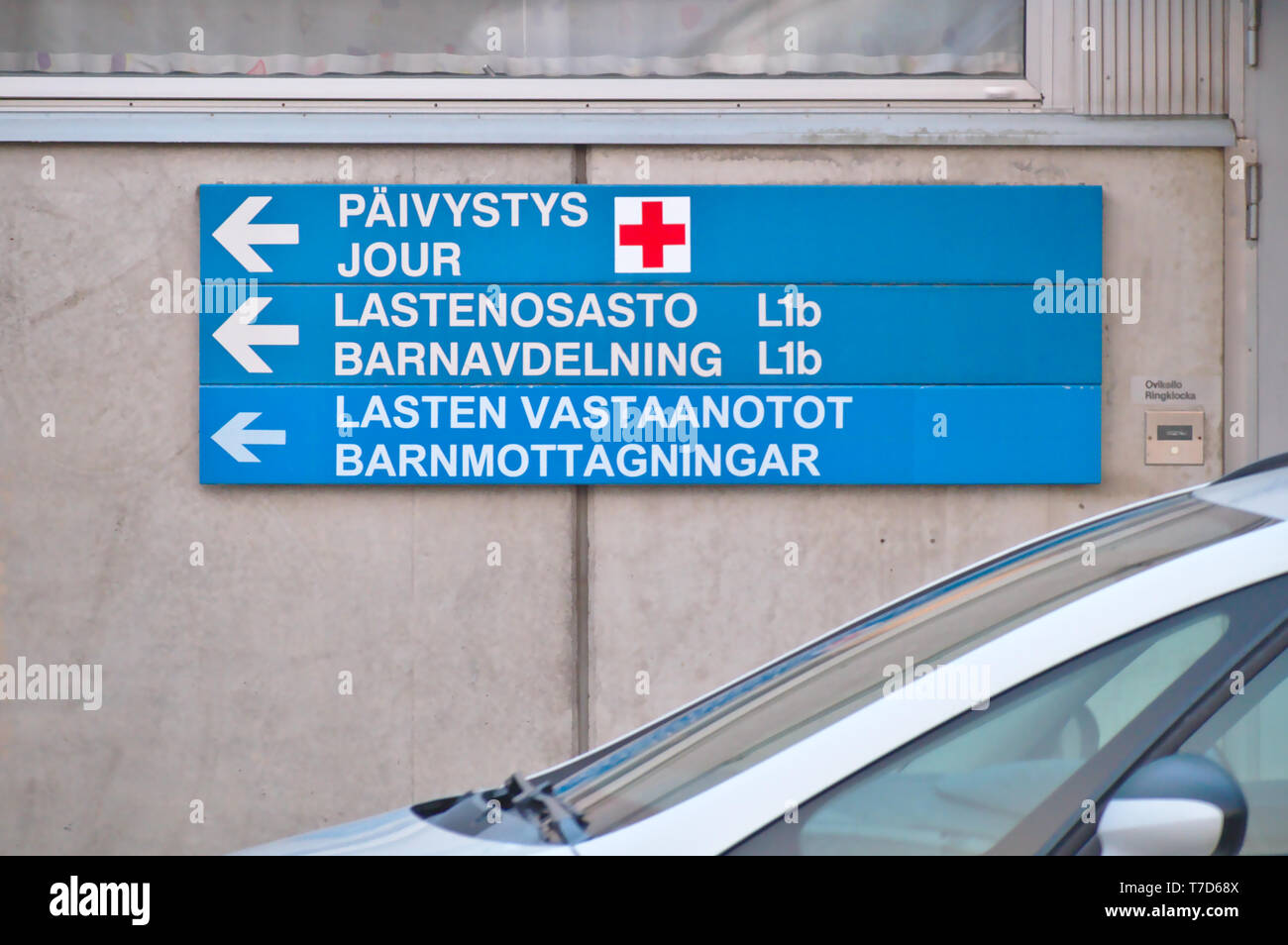 Blue sign on the wall of Jorvi Hospital in Espoo. Päivystys - Emergency ...