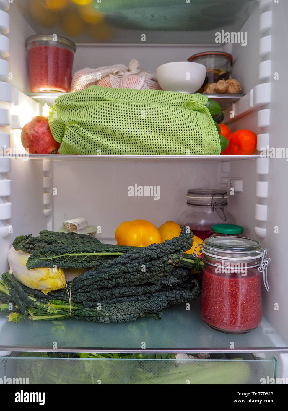 Open refrigerator of a zero waste and plastic free vegetarian lifestyle ...