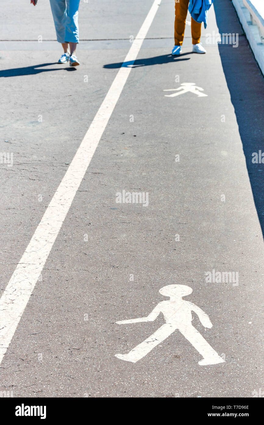 CANNES, FRANCE - APRIL 2019: Symbol for pedestrians walking on the ...