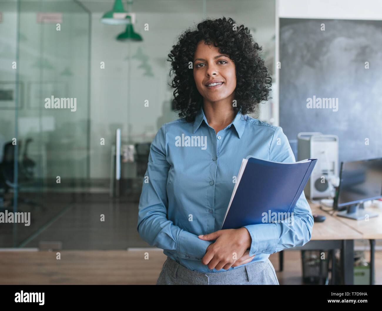 Carrying paperwork hi-res stock photography and images - Alamy