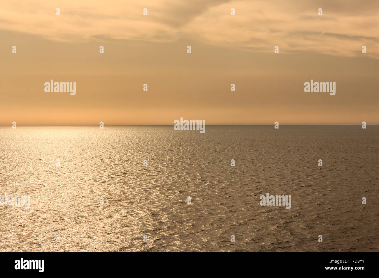 the sea at the first light of morning of a day with mist Stock Photo ...