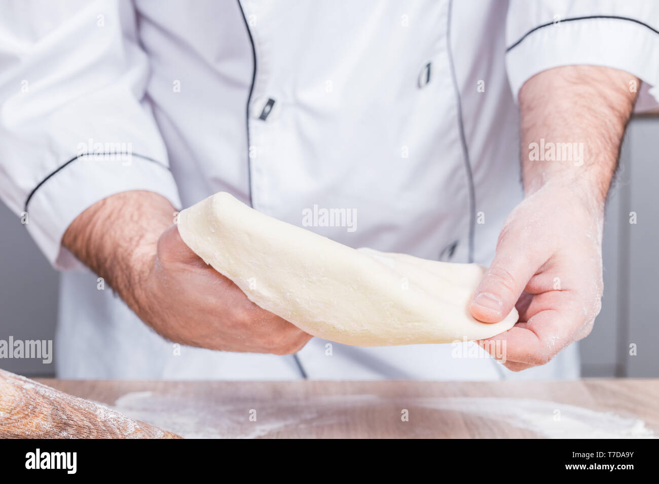Closeup man hands rolling hi-res stock photography and images - Alamy