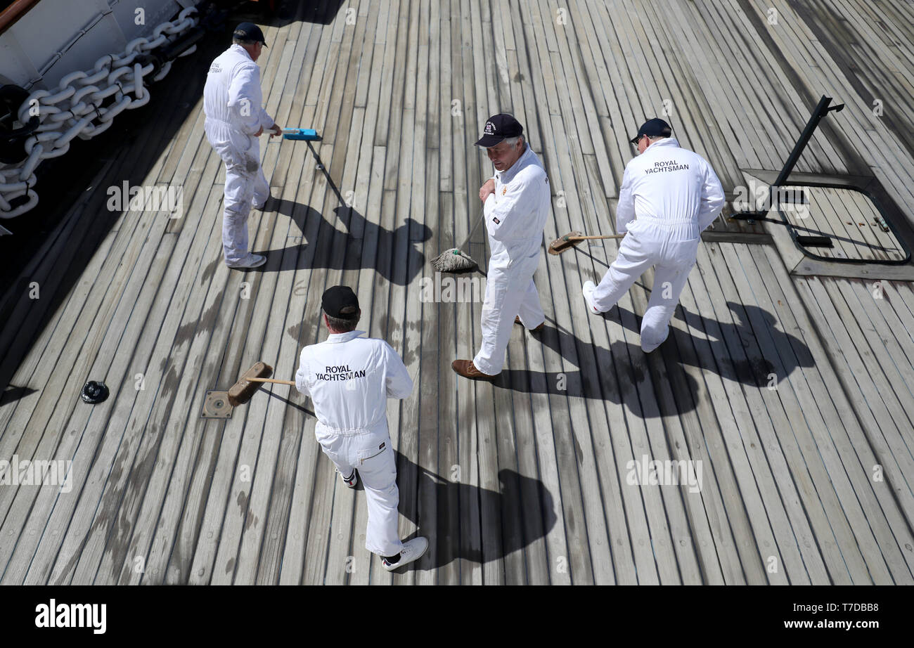 Former crew members of the Royal Yacht Britannia gather on the ship to ...