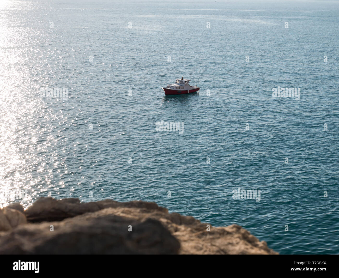 Small boat at the sea hi-res stock photography and images - Alamy