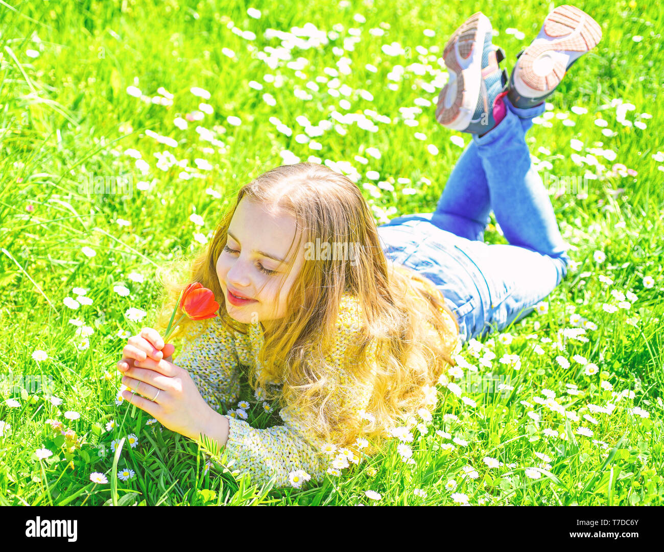 Child flower break hi-res stock photography and images - Alamy
