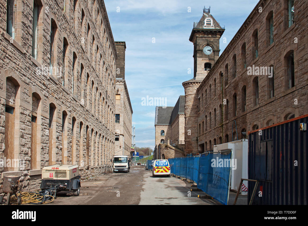 Plant and vehicles on location at a recently sandblasted mill complex ...