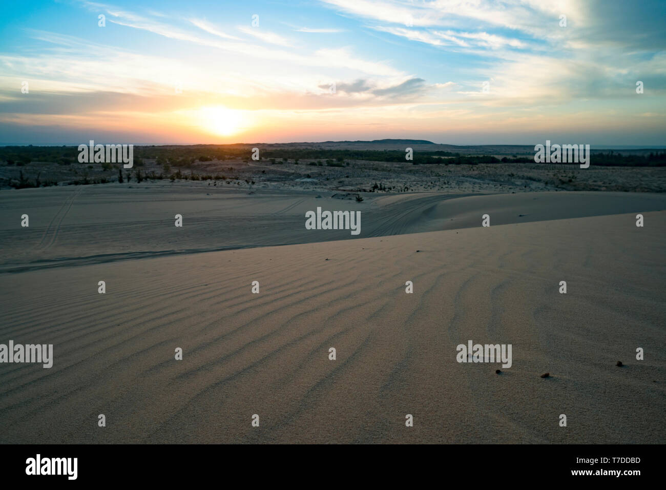 Beautiful sunrise with dramatic cloudscape at White Sand Dunes in Mui ...