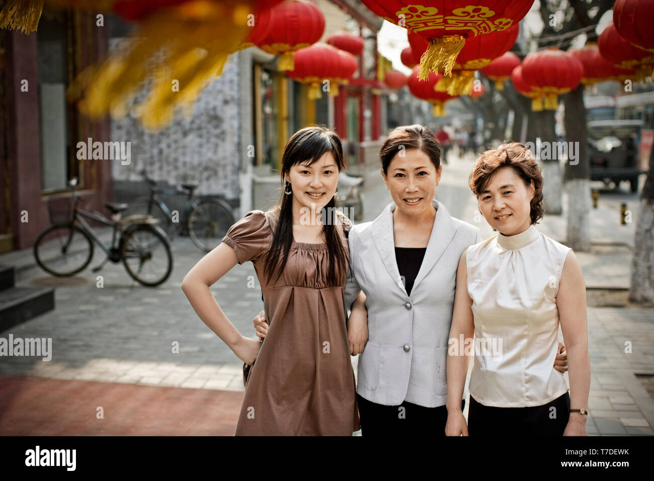Portrait of women smiling at the camera Stock Photo - Alamy