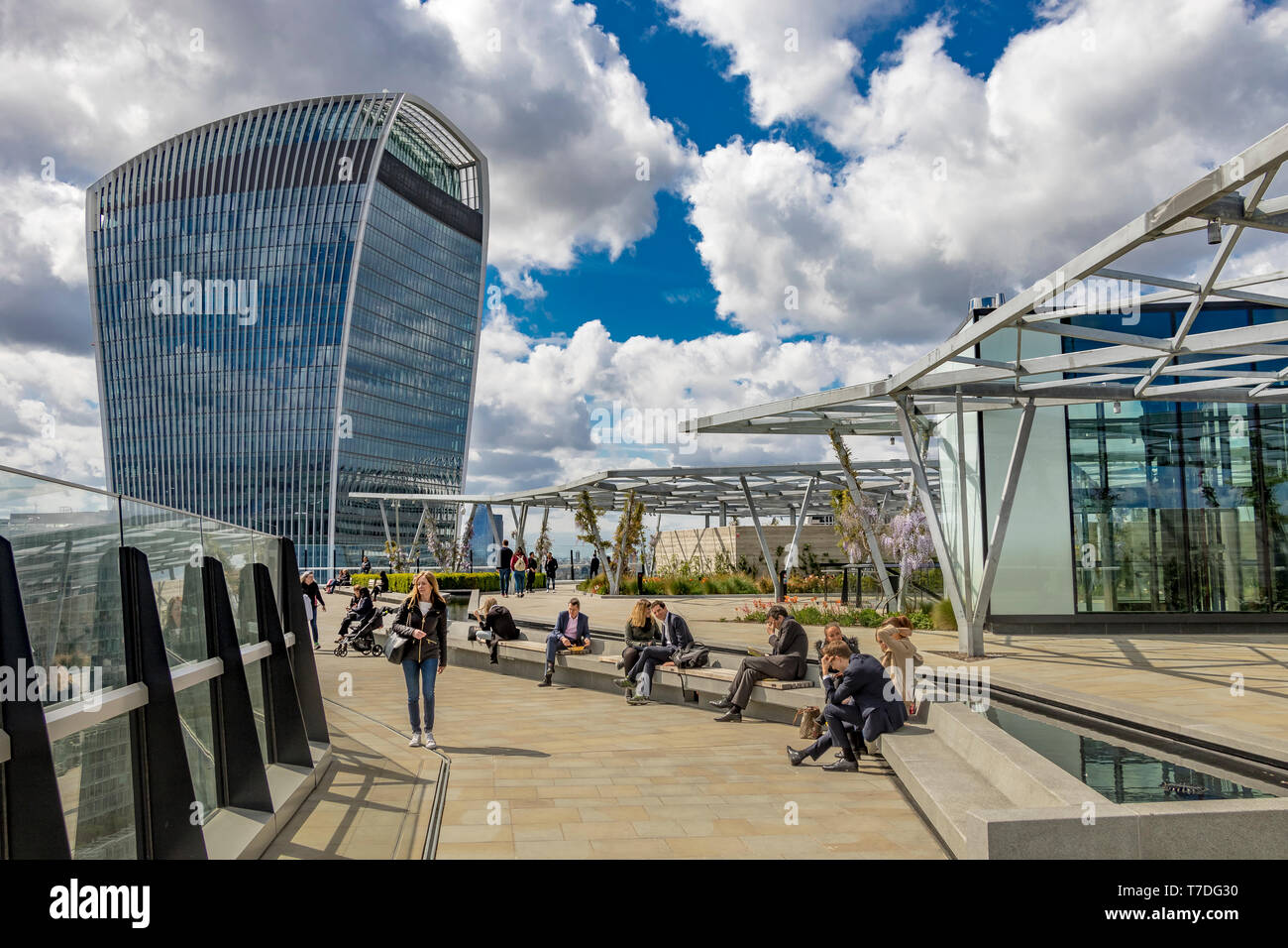 People enjoying the sunshine at The Garden at 120 , a roof garden in ...