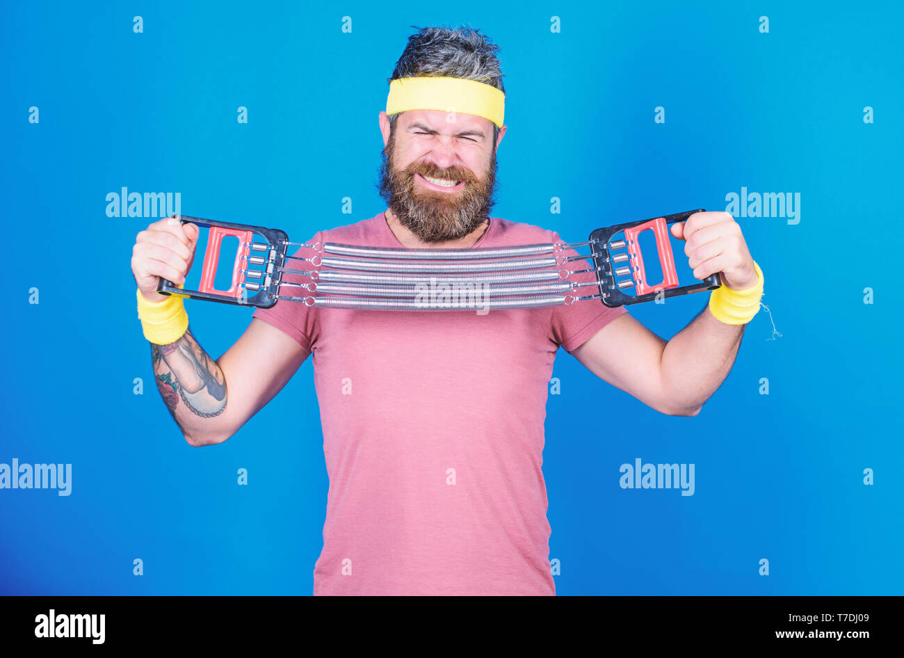 Try stretching exercise. Athlete workout with expander. Improve your ...