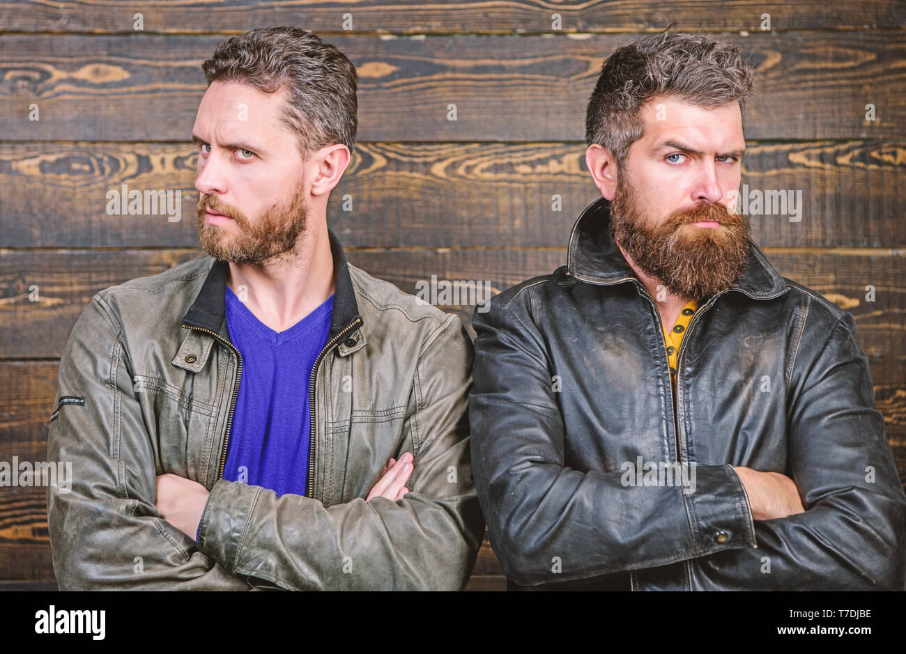 Men brutal bearded hipster. Confident competitors strict glance ...