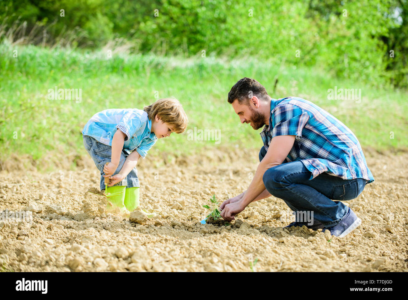 happy earth day. Family tree. rich natural soil. Eco farm. small boy ...