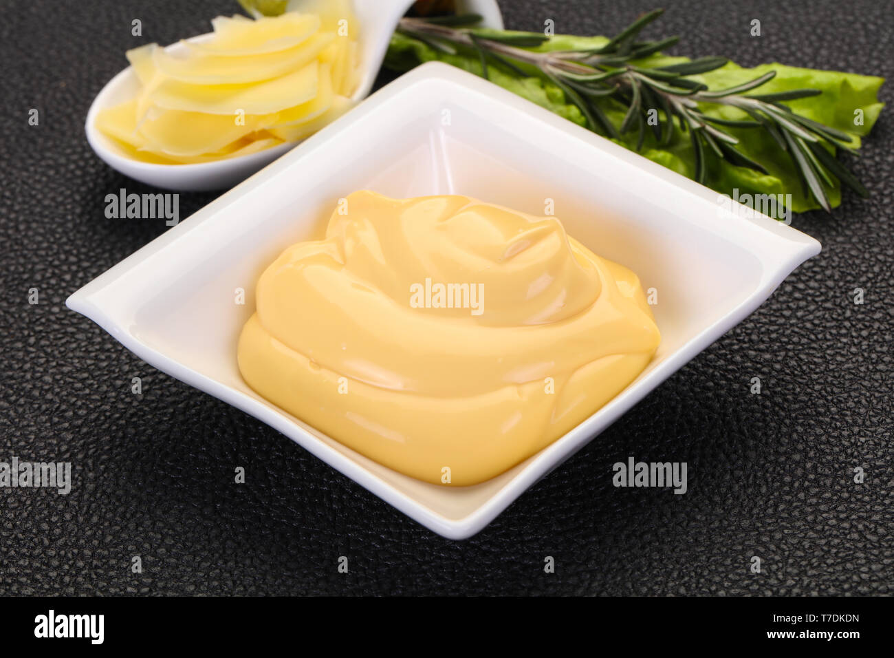 Cheese sauce in the bowl served sliced parmesan Stock Photo - Alamy