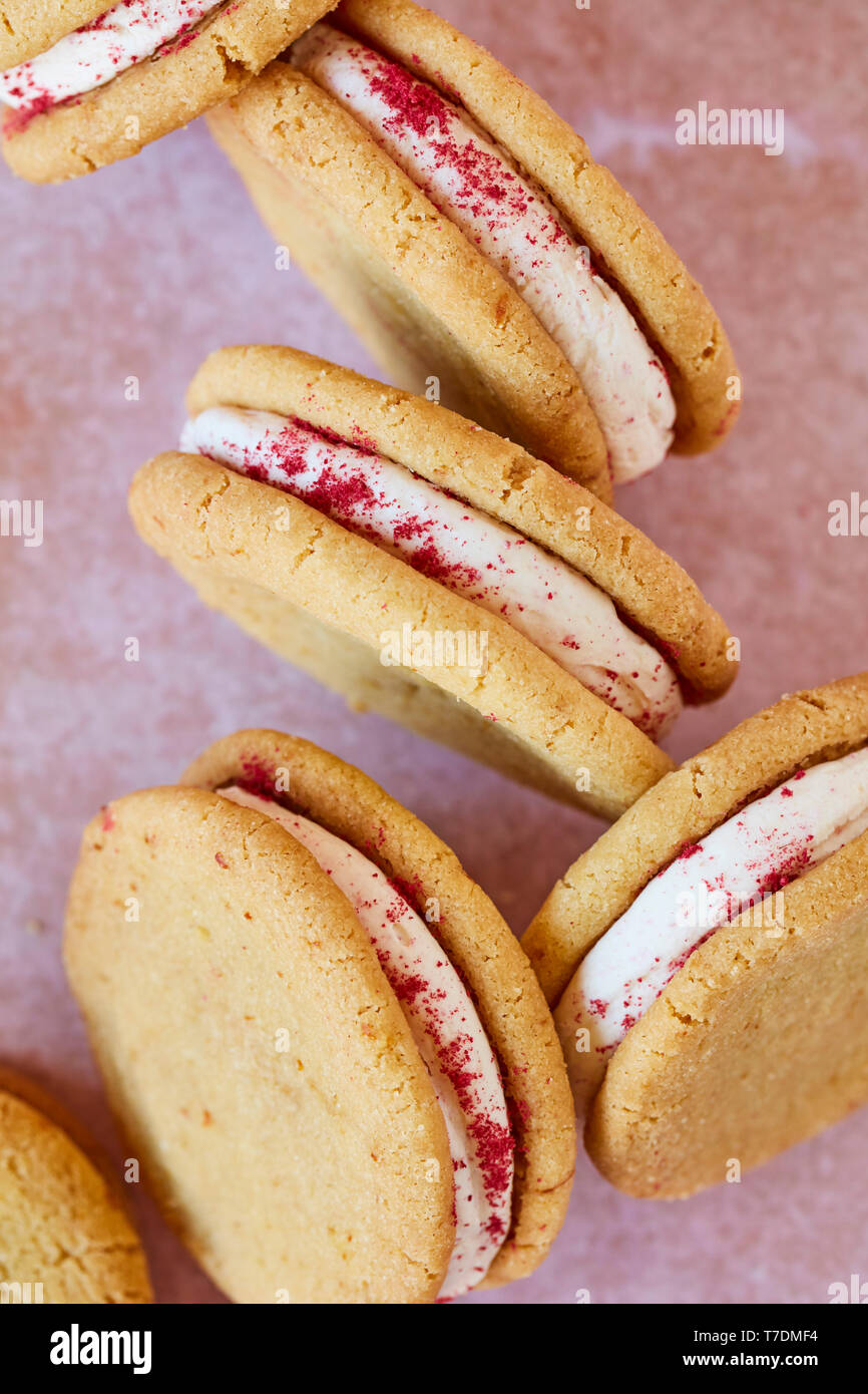 Orange and Raspberry Shortbread sandwich biscuits Stock Photo - Alamy