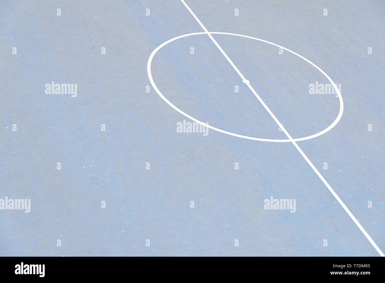 Center of a cement football field, seen from above, with copy space ...