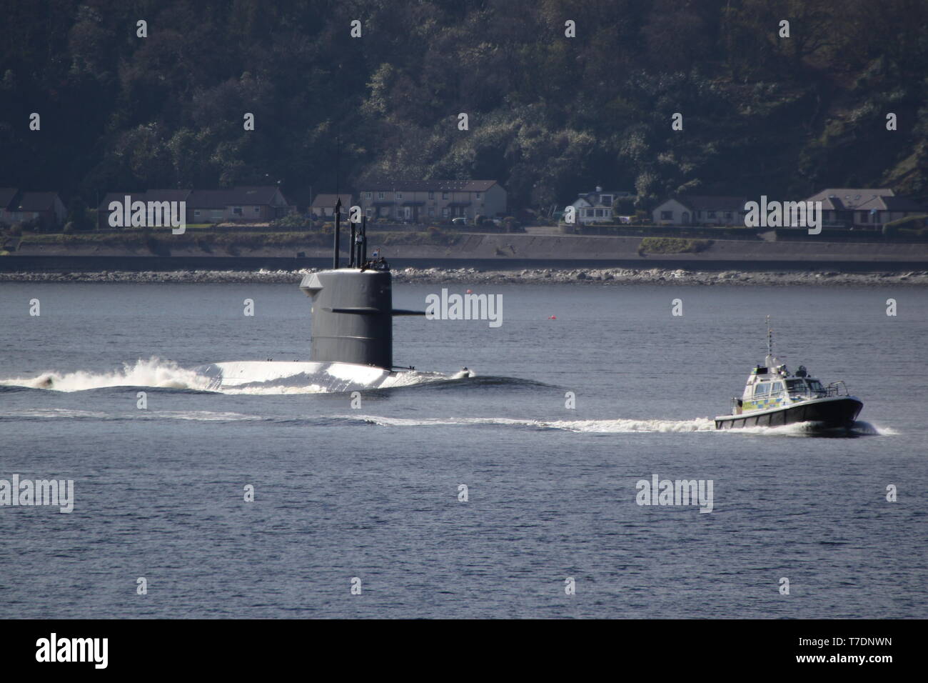 The Netherlands Navy submarine HNLMS Zeeleeuw (S803), being escorted up ...