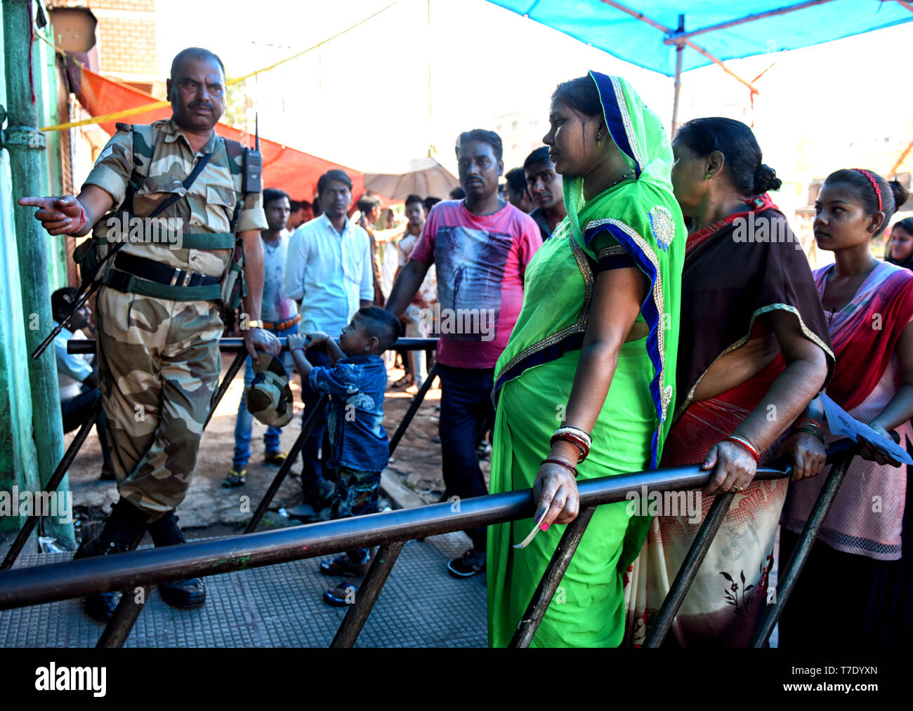 A CISF (Central Industrial Security Force) person seen giving ...