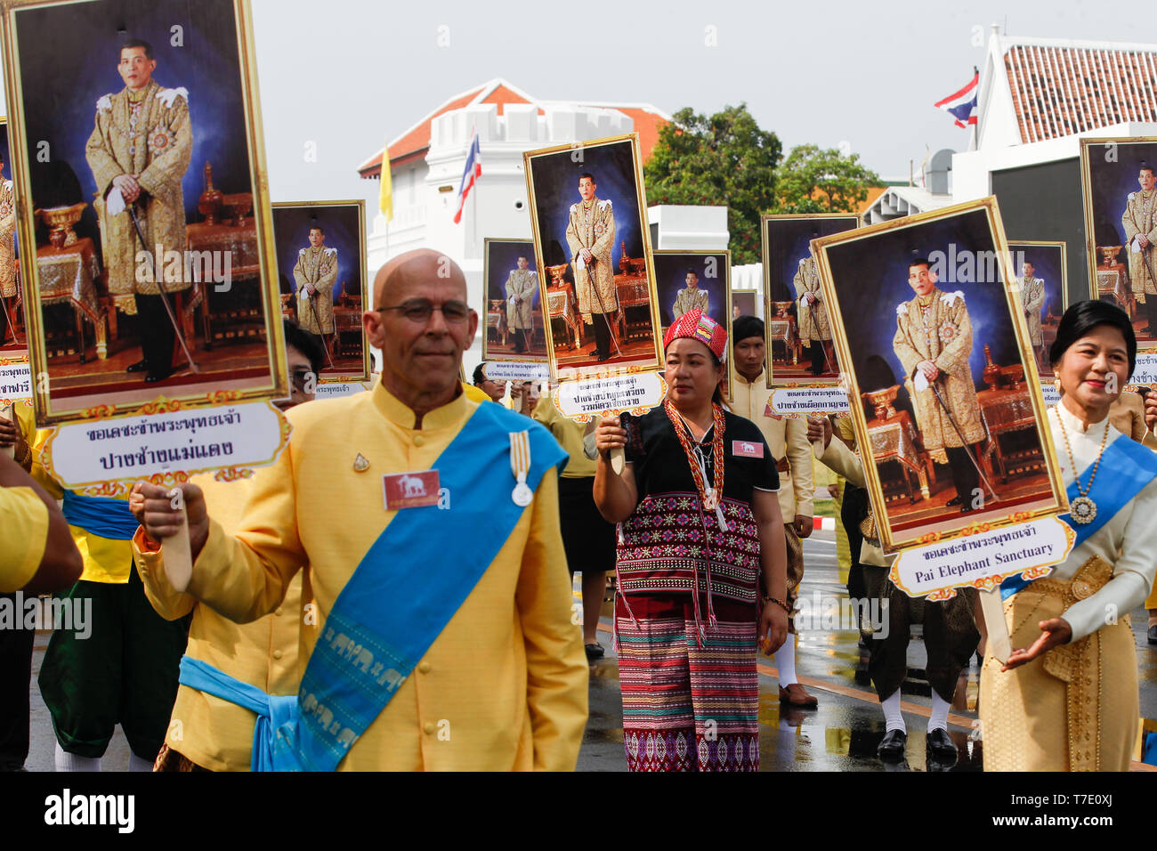 Well-wishers seen holding portraits of Thailand's King Rama X during an ...