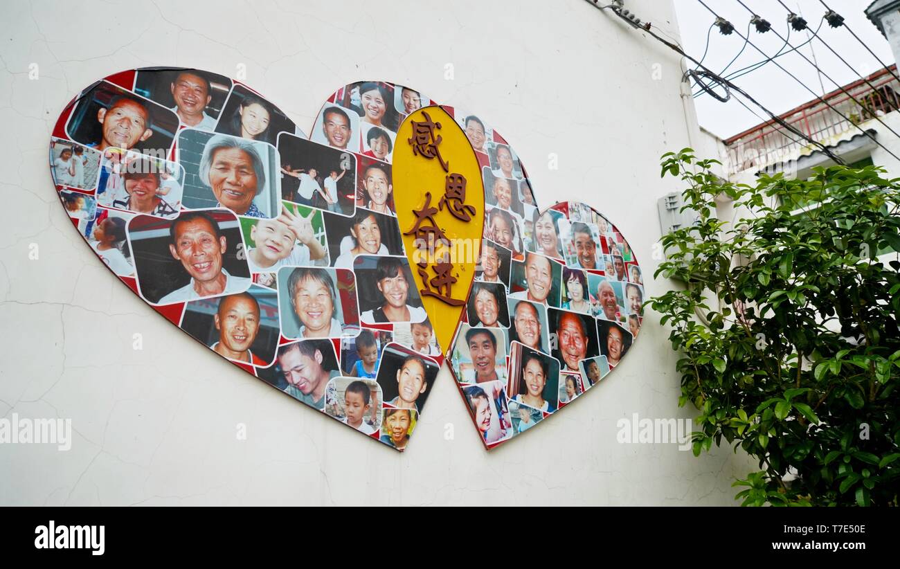 Ruijin. 7th May, 2019. Photo taken on May 7, 2019 shows a picture wall ...