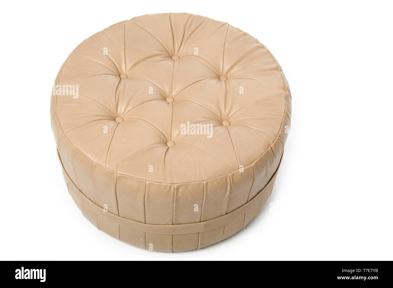 Leather floor stool on white background Stock Photo - Alamy