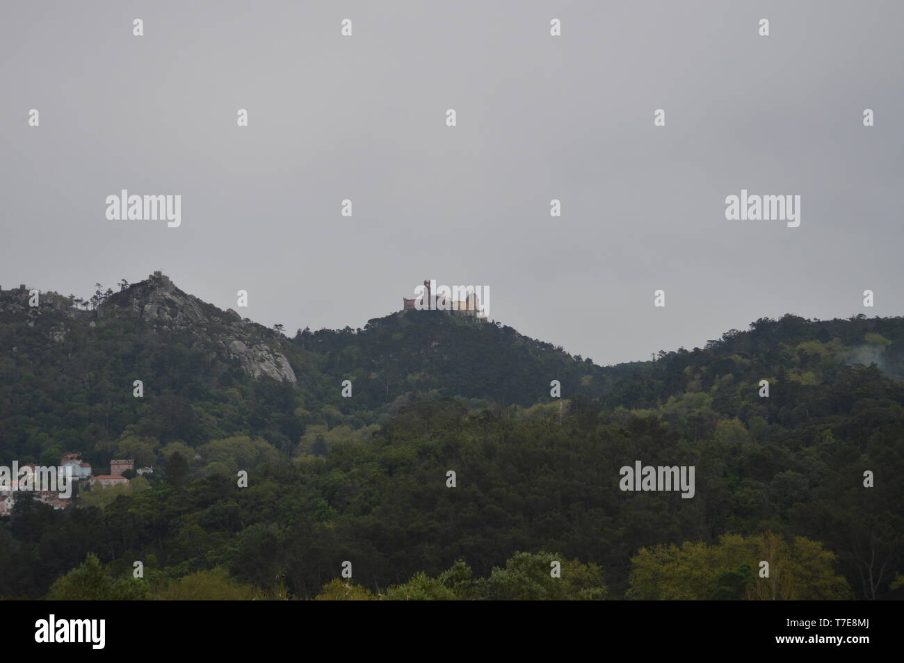 Wonderful Views Of The Palace Of Pena At The Top Of A Cliff On A Cloudy ...
